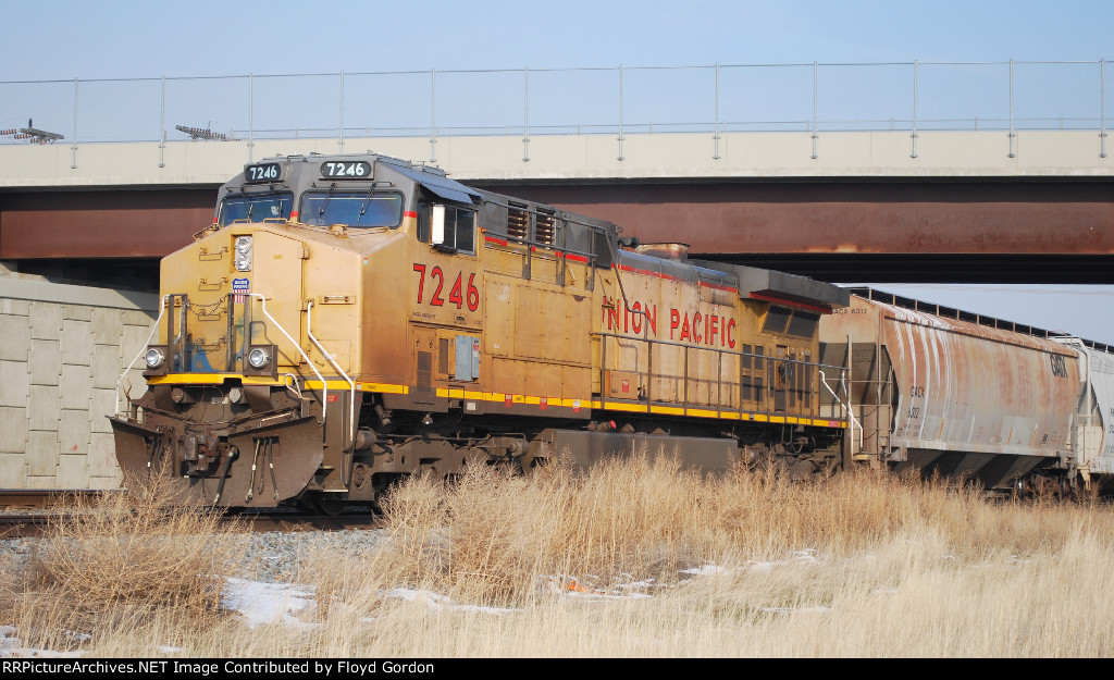 UP 7246 is DPU on west headed covered hopper shuttle